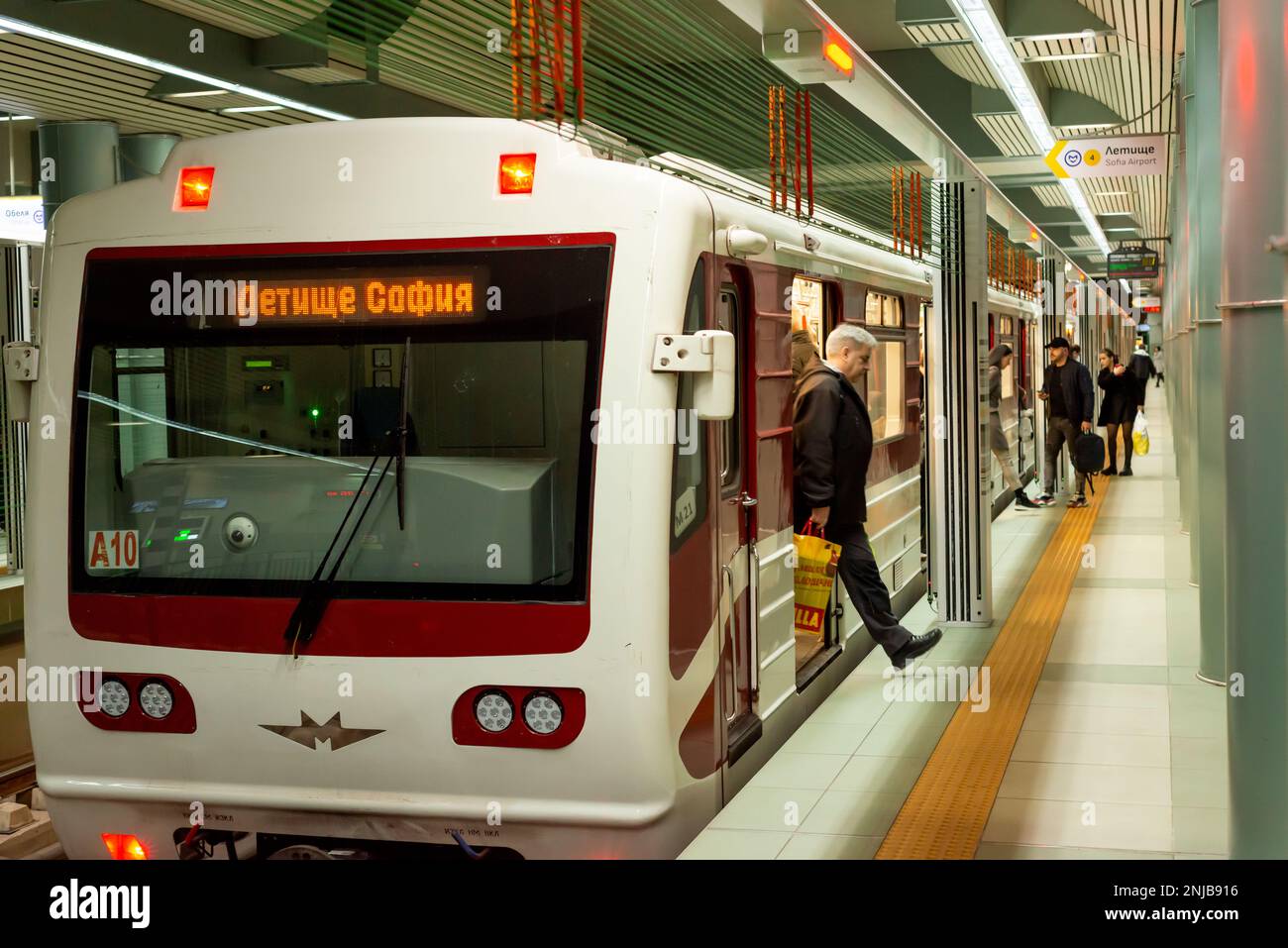 Commuters disembark train at an underground, subway or metro station in Sofia, Bulgaria, Eastern ...