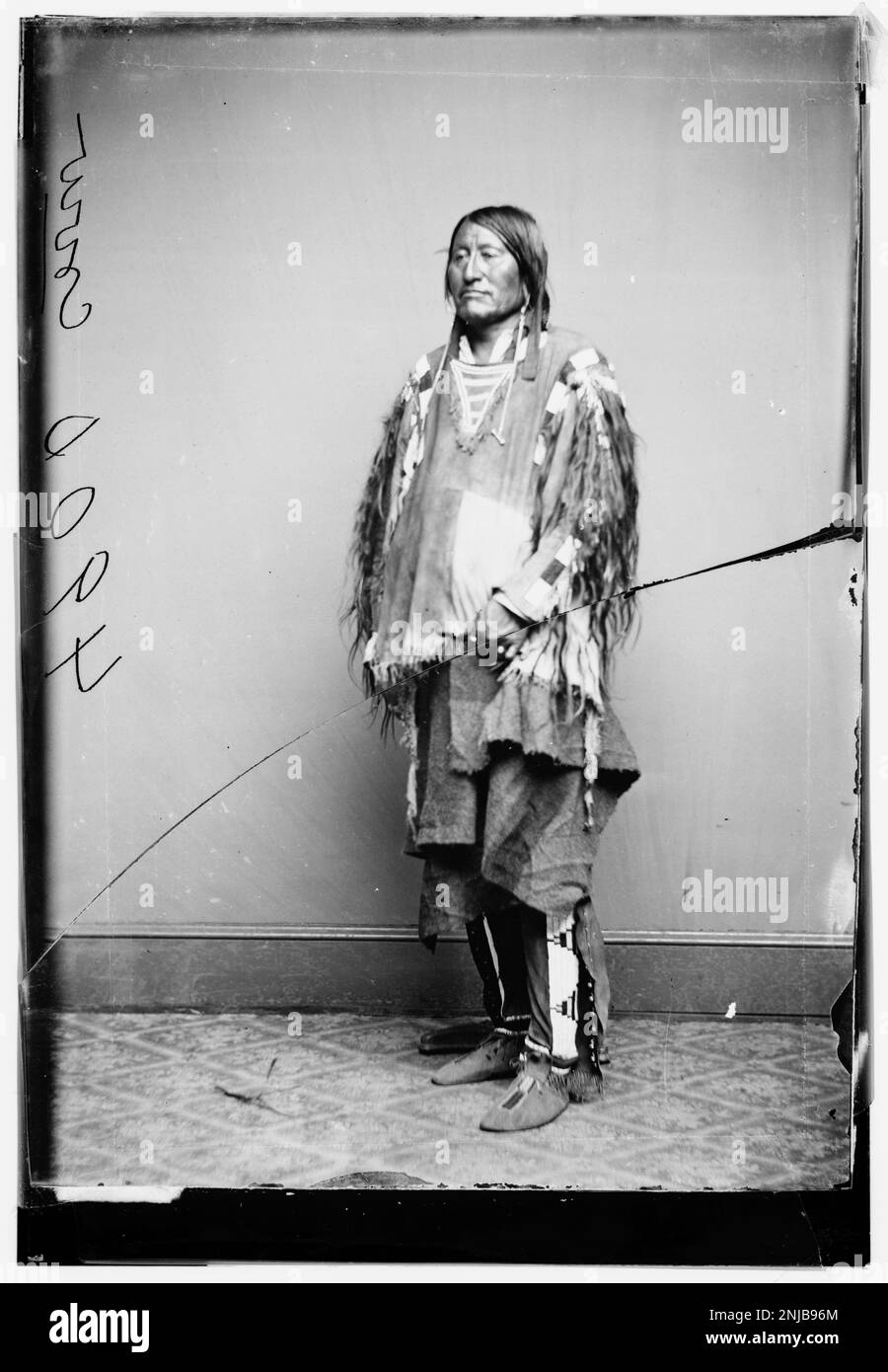 Portrait of a Crow Indian chief, depicting the cultural significance of ...