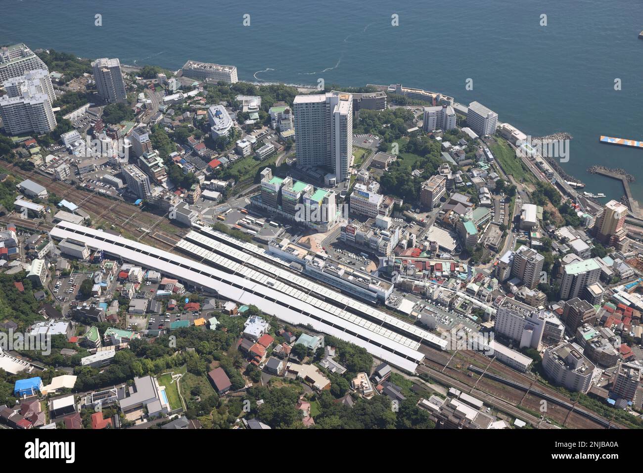 An aerial photo shows Atami Station and a spring resort area in Atami ...