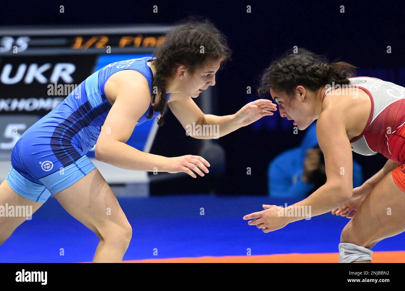 Oleksandra KHOMENETS of Ukraine (blue) and Karla Lorena GODINEZ ...