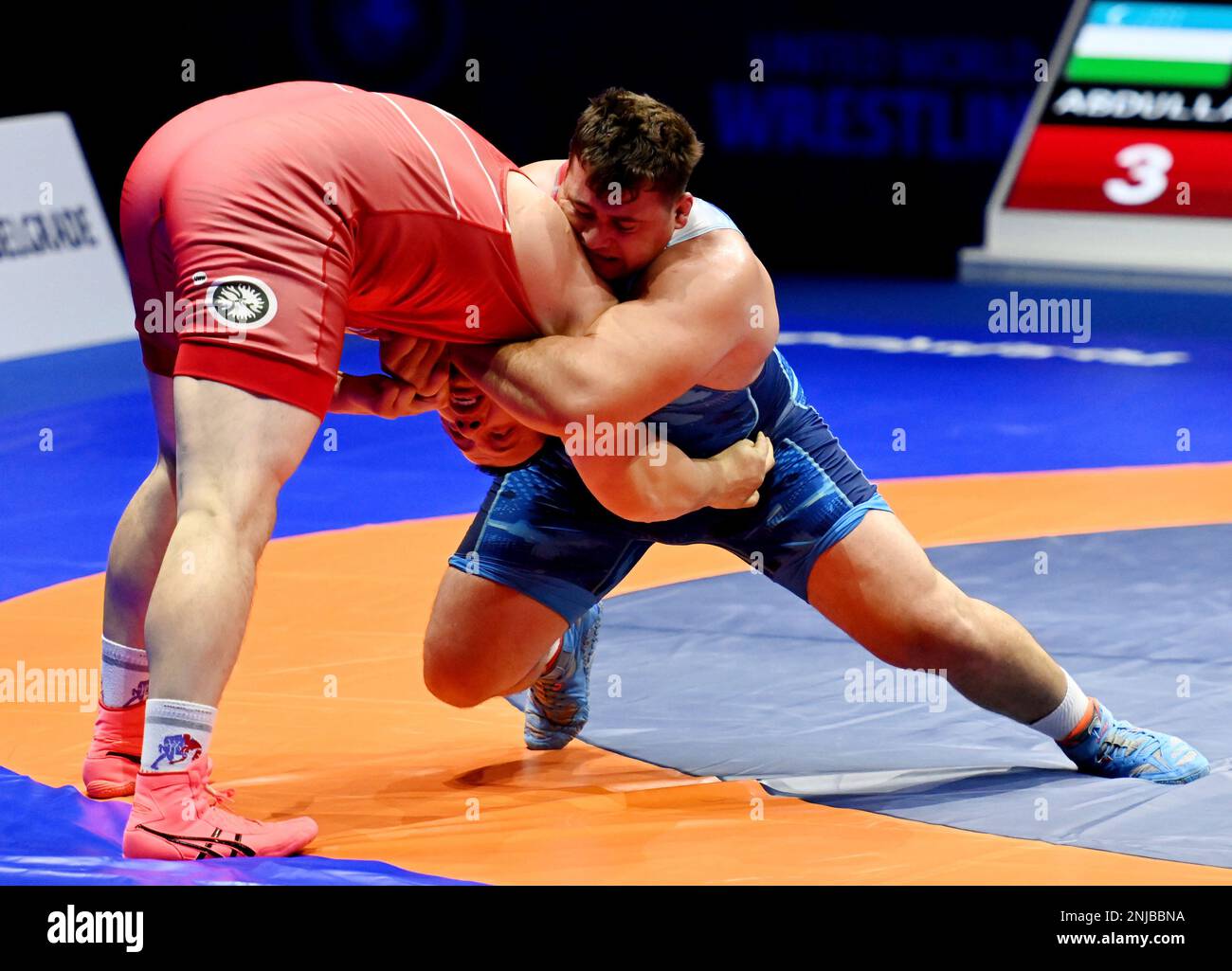 Riza KAYAALP of Turkey and Muminjon ABDULLAEV of Uzbekistan compete during the semifinal of ...