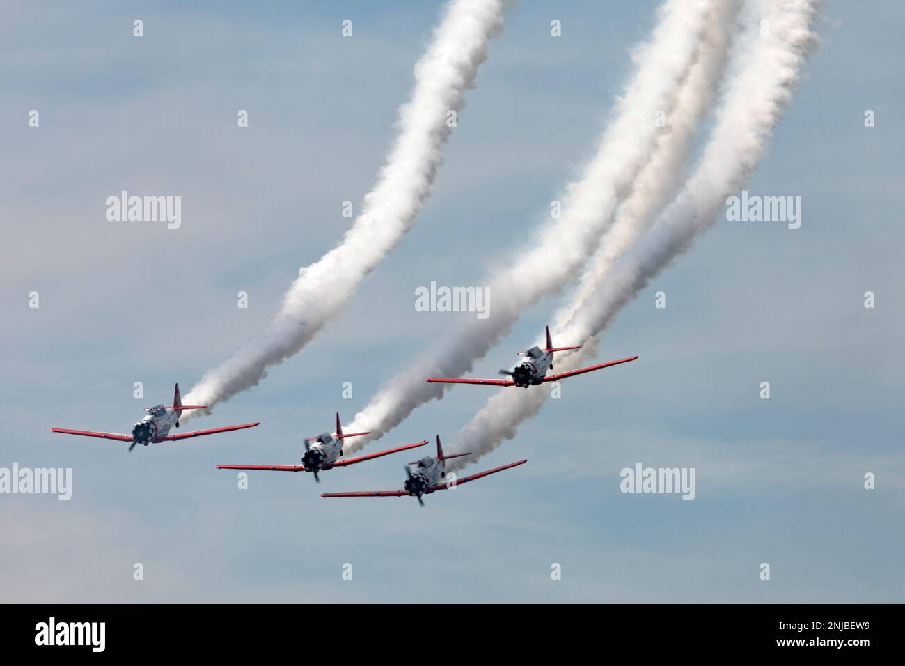 The Aeroshell Aerobatic Team fly by in their North American AT-6 Texan ...