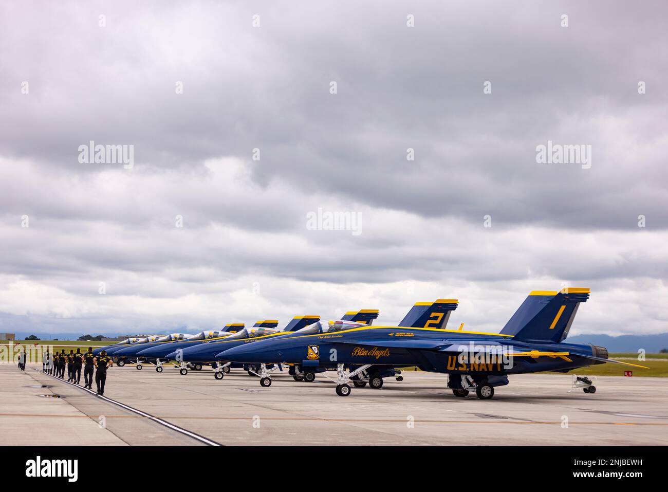 The crew leaves the flight line as the Blue Angels flight demonstration ...