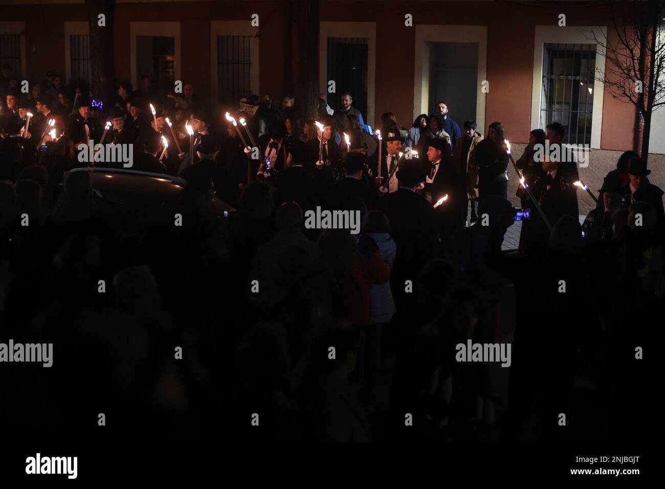 Dozens of people during the parade of the burial of the sardine, February 22, 2023, in Madrid ...