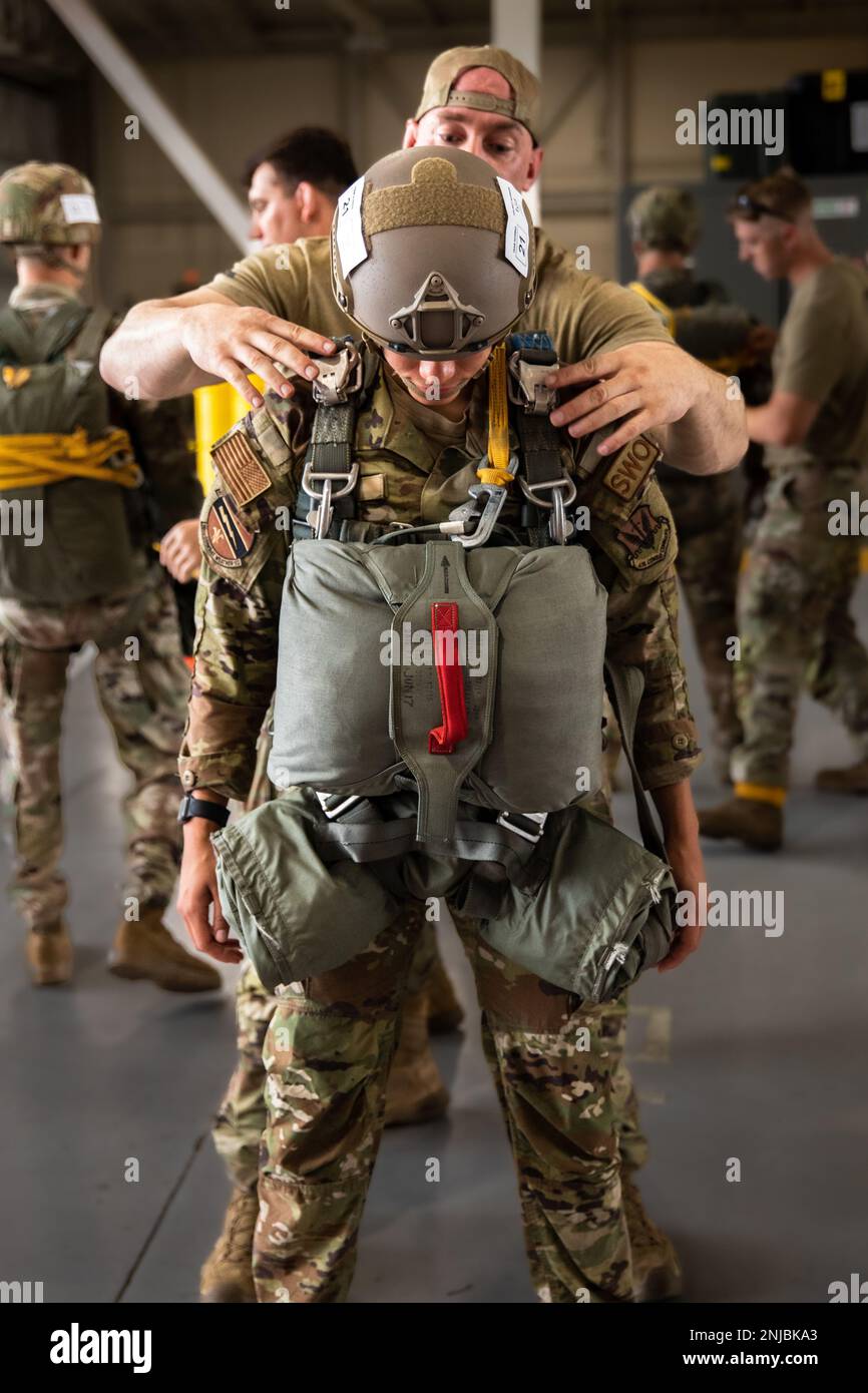 U.S. Army Jumpmaster, performs Jumpmaster Personal Inspection (JMPI) on ...
