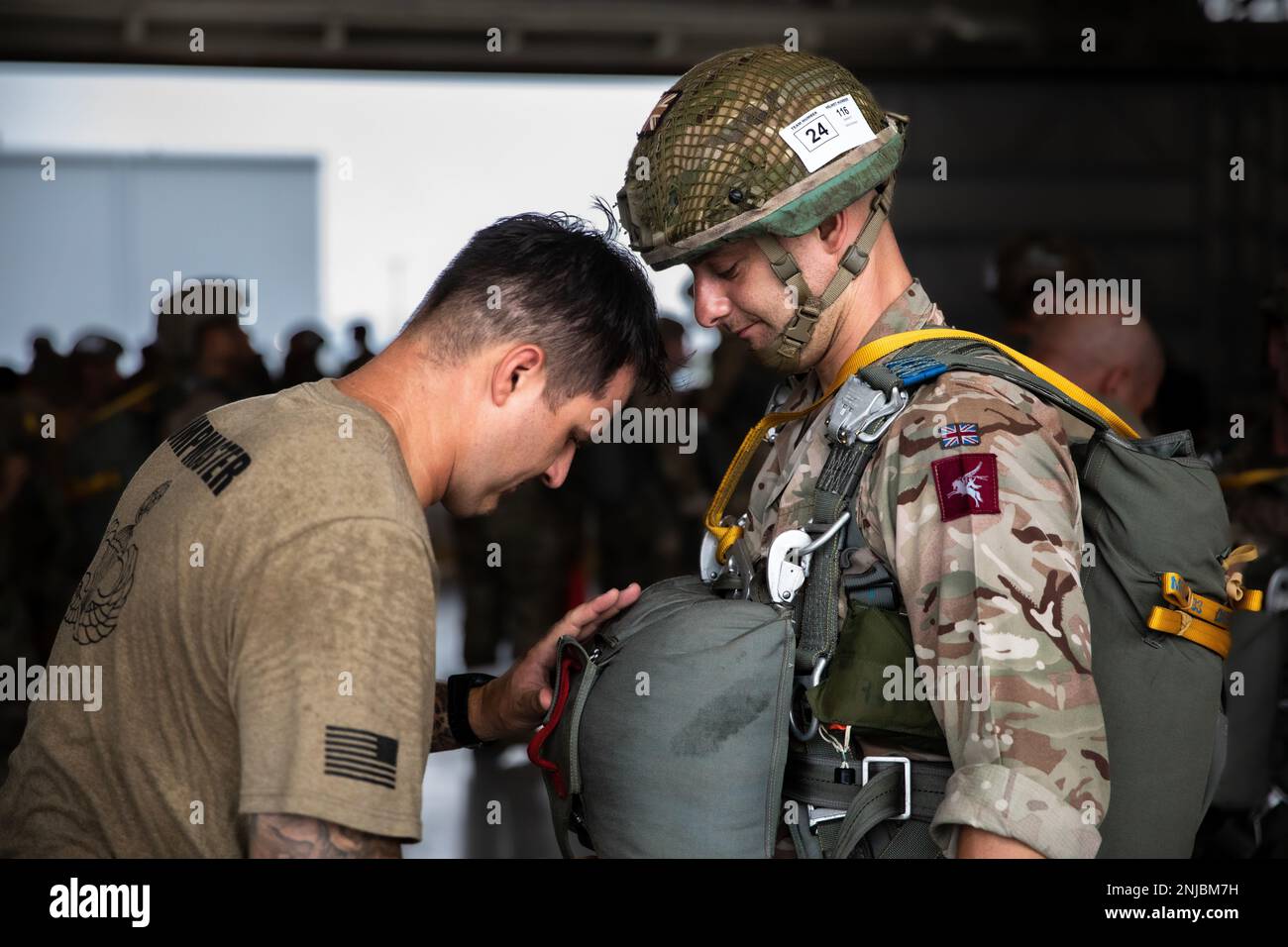 U.S. Army Jumpmaster, performs Jumpmaster Personal Inspection (JMPI) on ...