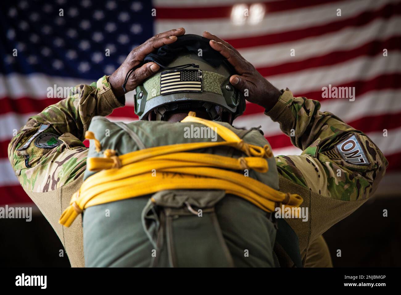 U.S. Army Jumpmaster, performs Jumpmaster Personal Inspection (JMPI) on ...