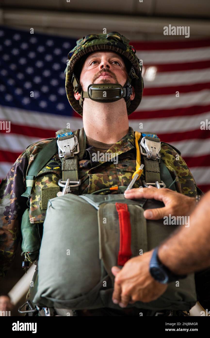 U.S. Army Jumpmaster, performs Jumpmaster Personal Inspection (JMPI) on ...
