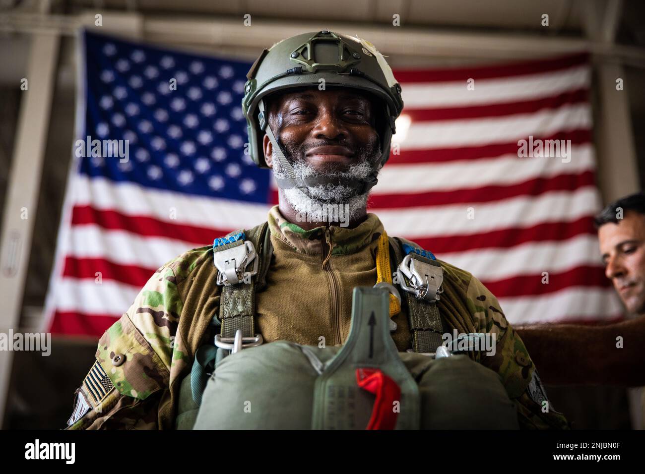 U.S. Army Jumpmaster, performs Jumpmaster Personal Inspection (JMPI) on ...
