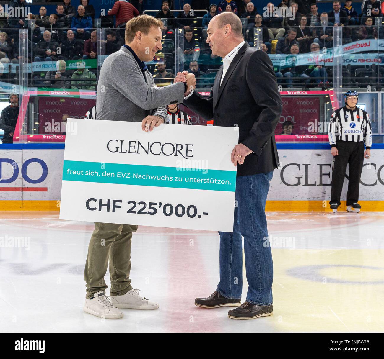 Glencore representative Markus Walt and EVZ youth director Andreas ...