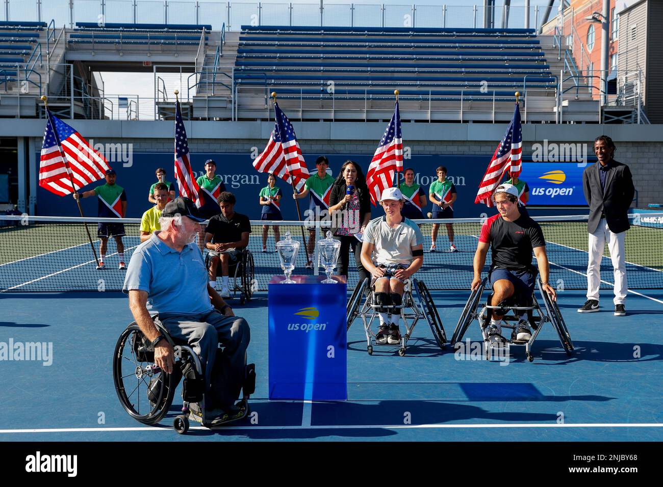 Ben Bartram and Dahnon Ward receive trophies during a junior wheelchair boys' doubles ...