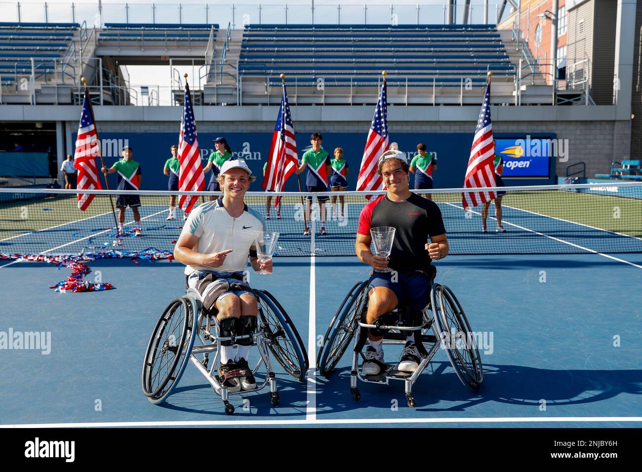 Ben Bartram and Dahnon Ward pose with trophies during junior wheelchair ...