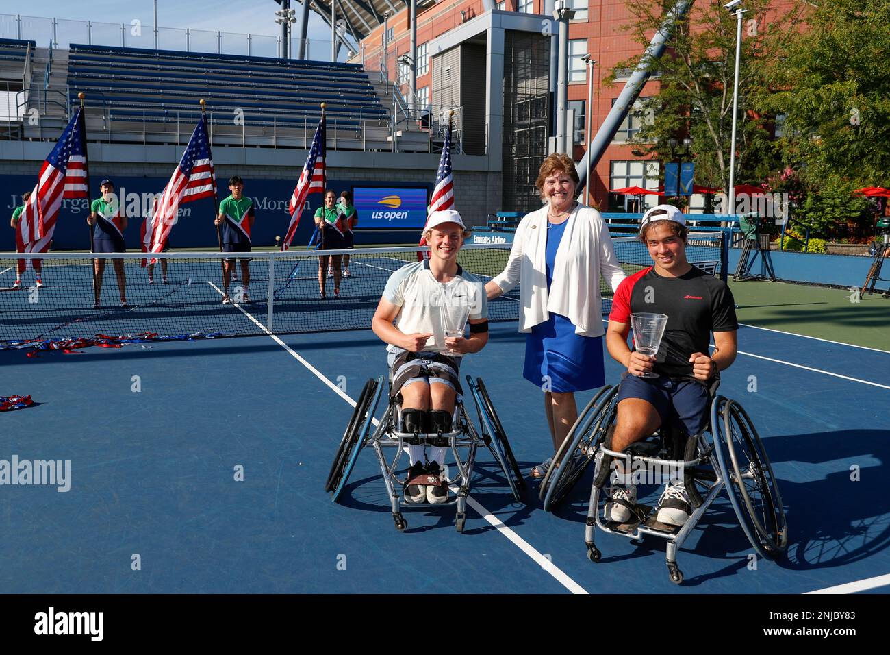Ben Bartram, Dahnon Ward, and USTA staff pose with trophies during ...