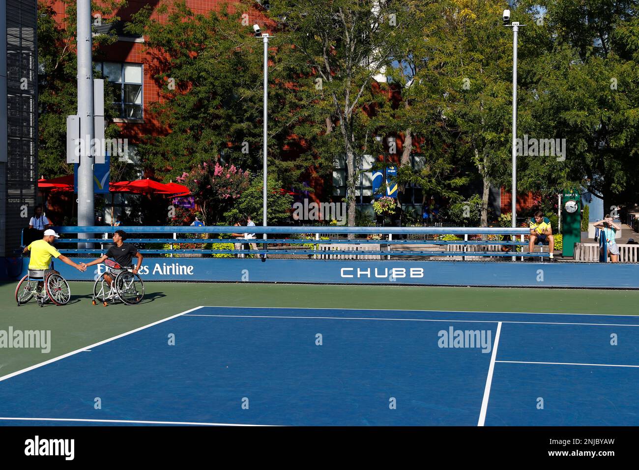 Ivar van Rijt and Saalim Naser high fives while John Peers and Storm ...
