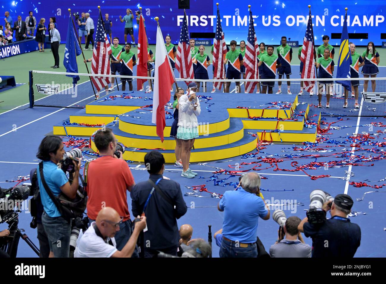 An overall view of Iga Swiatek posing with a trophy during a women's ...