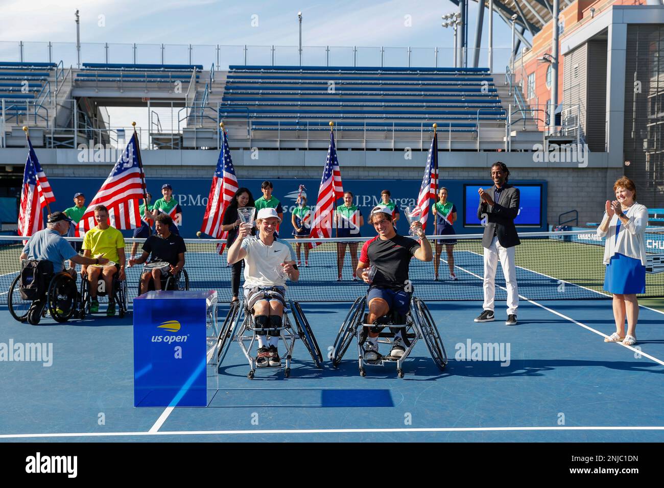 Ben Bartram and Dahnon Ward pose with trophies during a wheelchair doubles championship match at ...