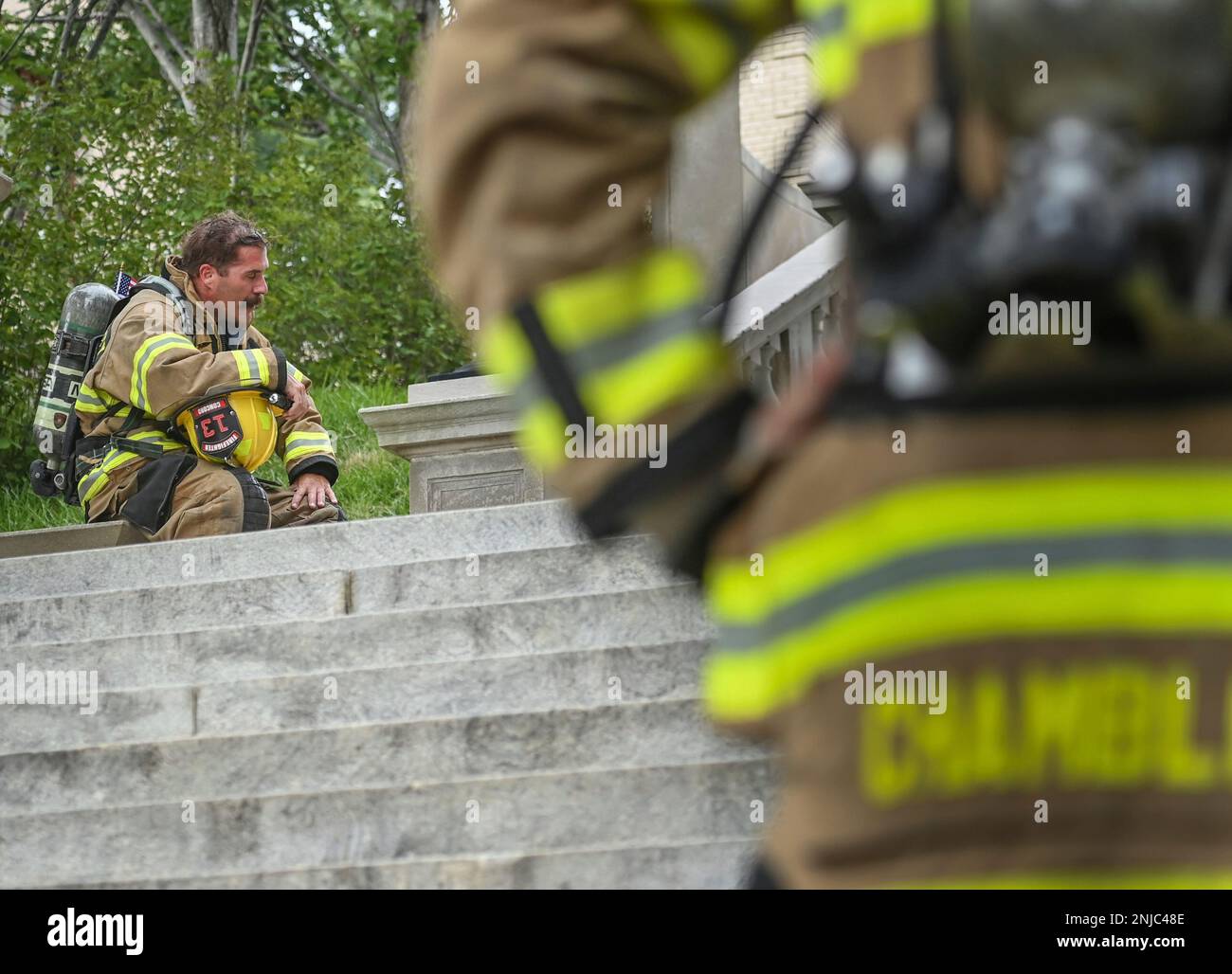 Lynchburg City Firefighter Dustin McClure rests during the 9/11 ...