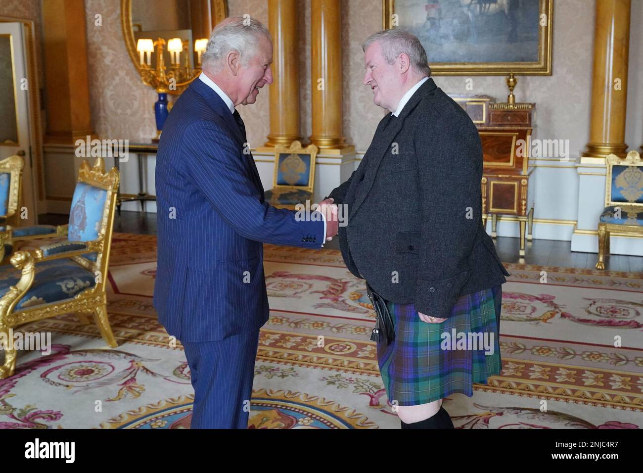 King Charles III shakes hands with SNP Westminster leader Ian Blackford ...