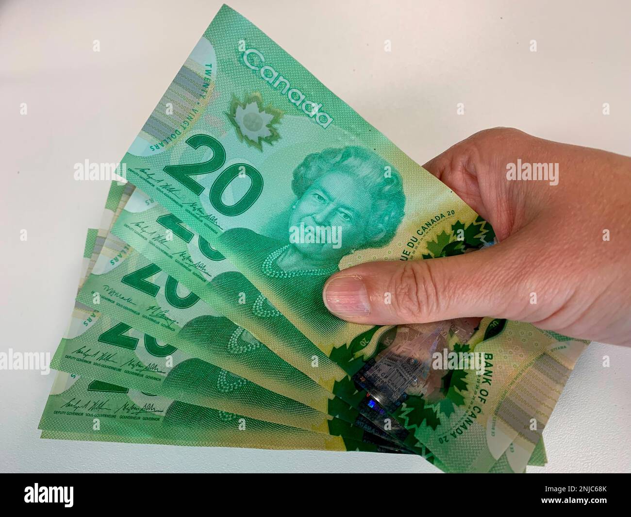 Canadian $20 bills are pictured in Toronto, Friday, Sept.9, 2022. As ...