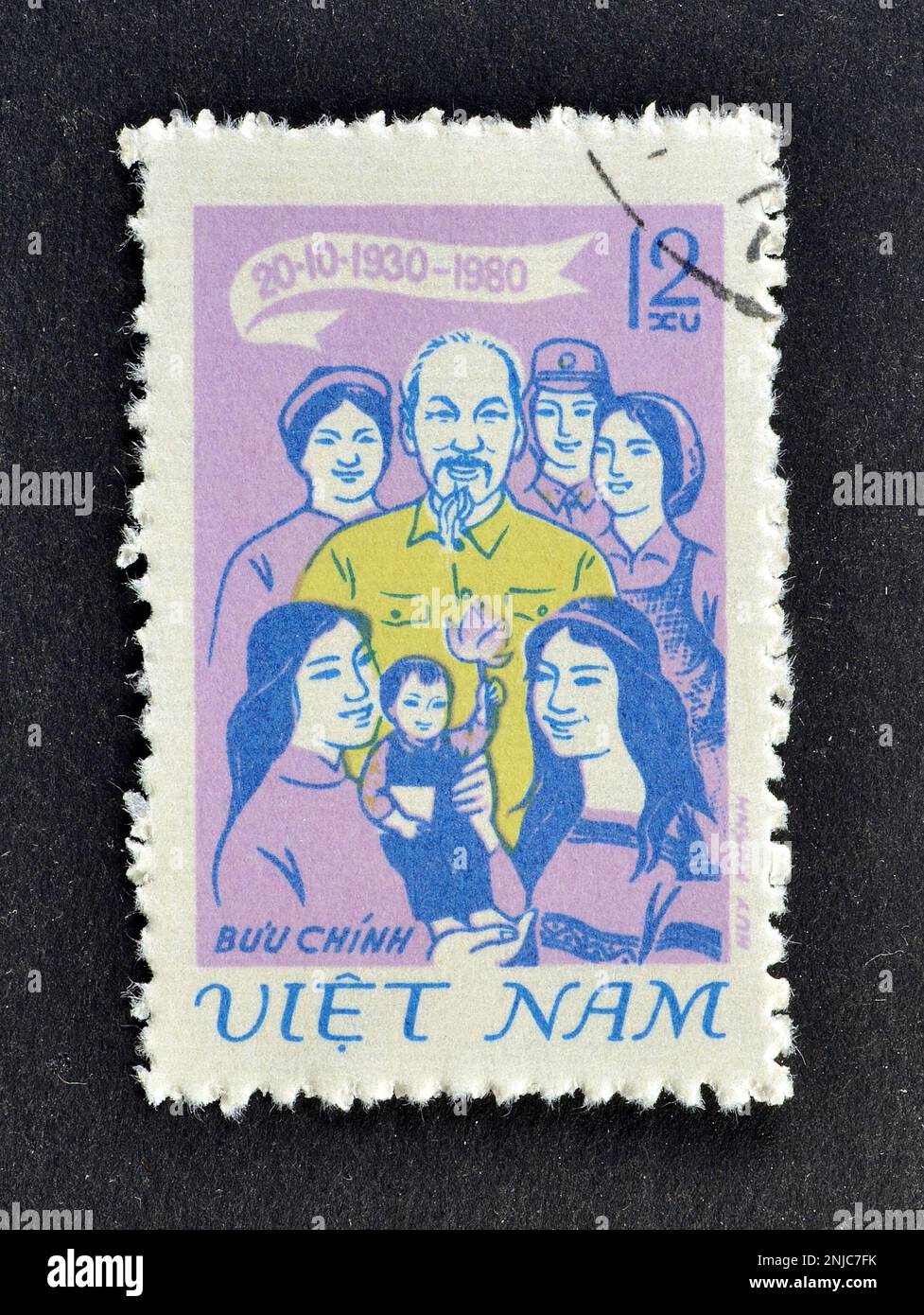 Cancelled postage stamp printed by Vietnam, that shows Ho Chi Minh with ...