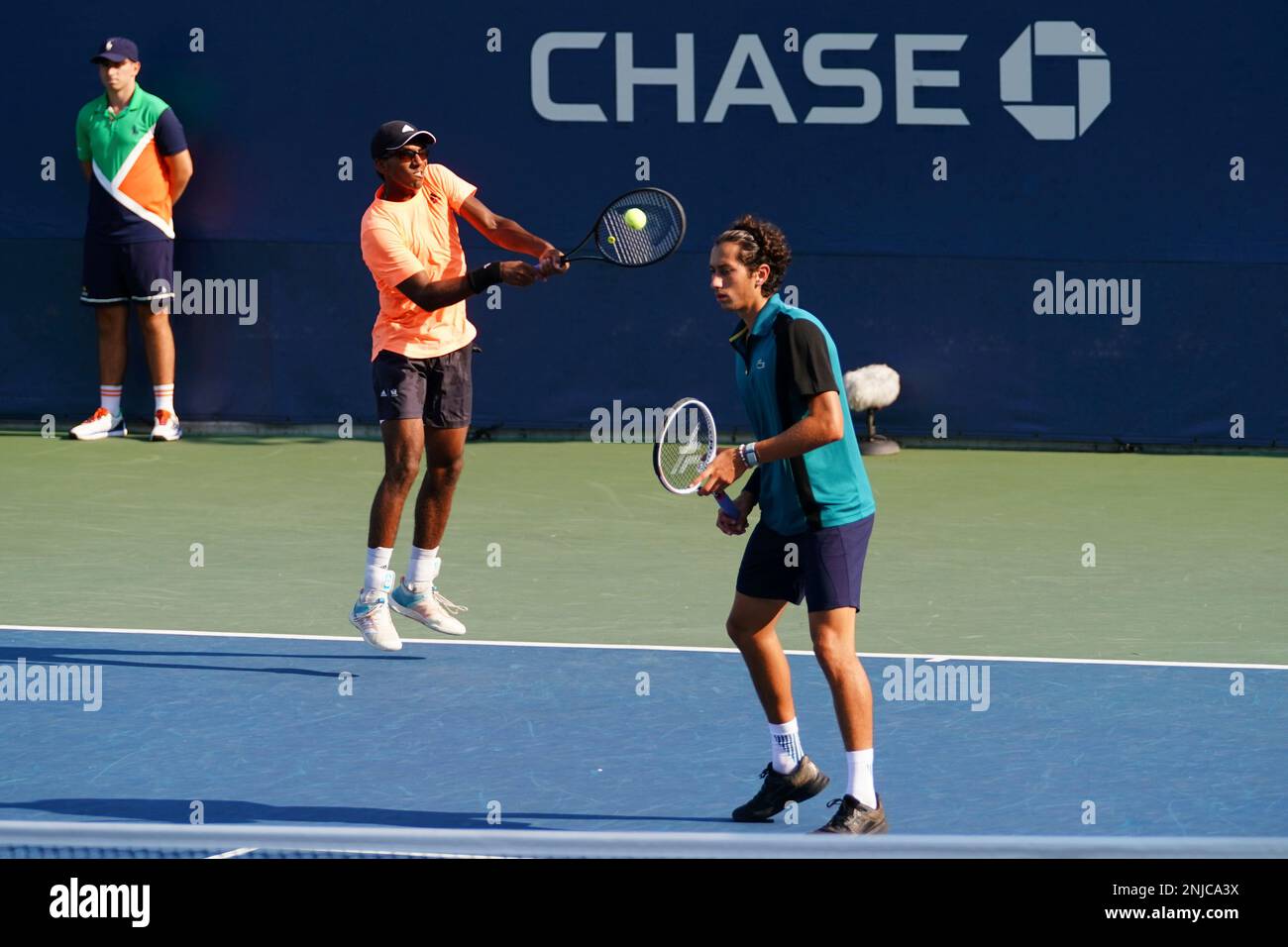 Ozan Baris and Nishesh Basavareddy during a junior boys' doubles ...