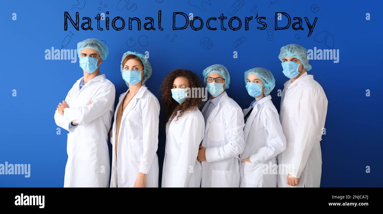 Group of doctors on blue background. National Doctors Day Stock Photo ...