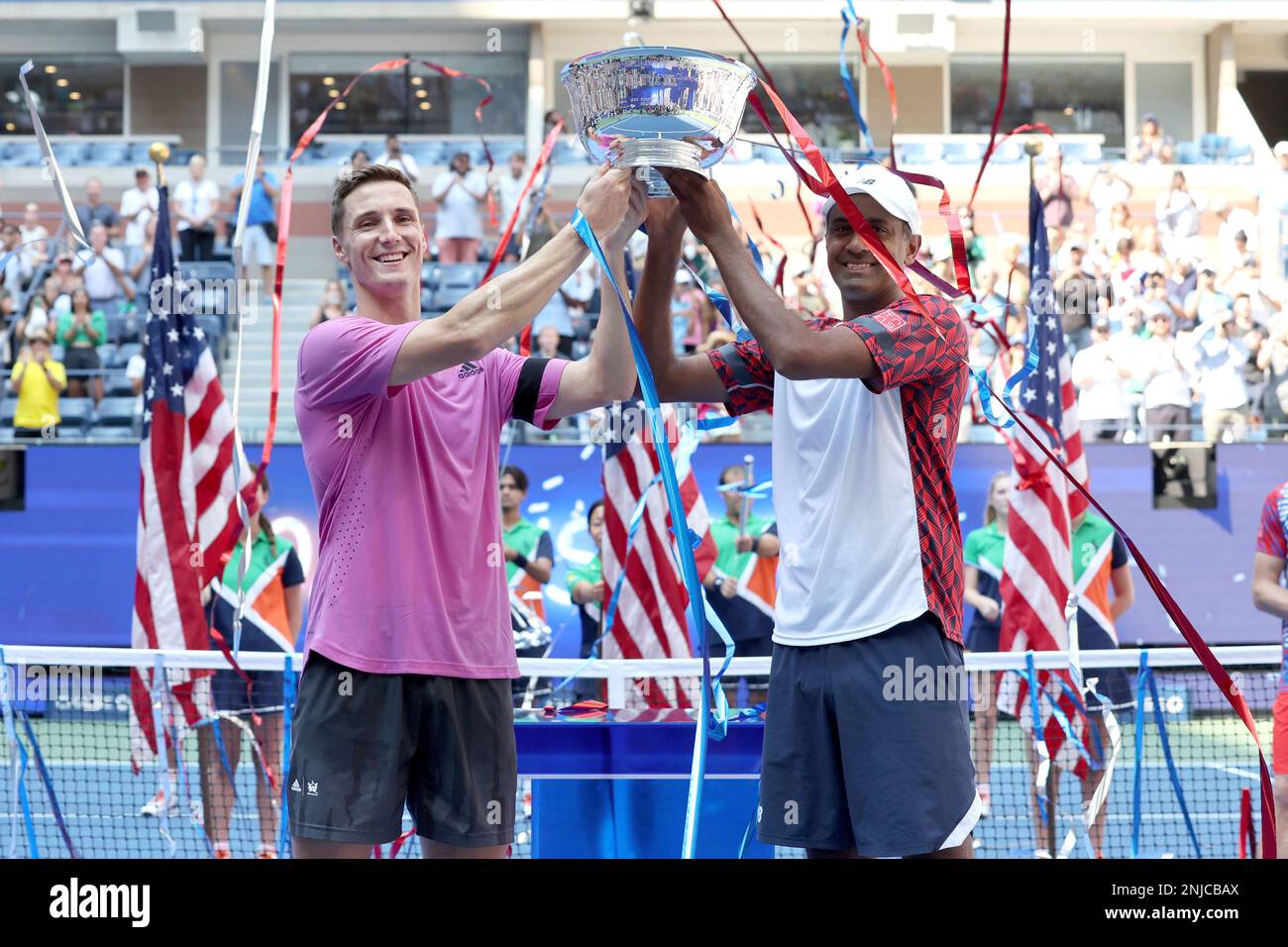 Joe Salisbury and Rajeev Ram receive their trophy after winning the men ...