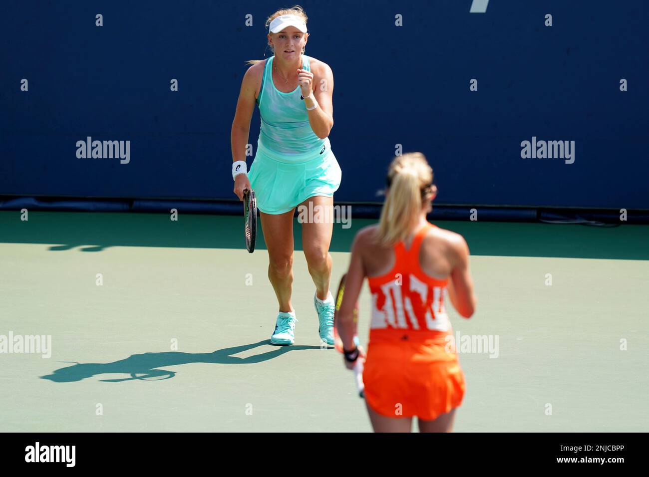 Liv Hovde and Taylah Preston react during a junior girls' doubles ...