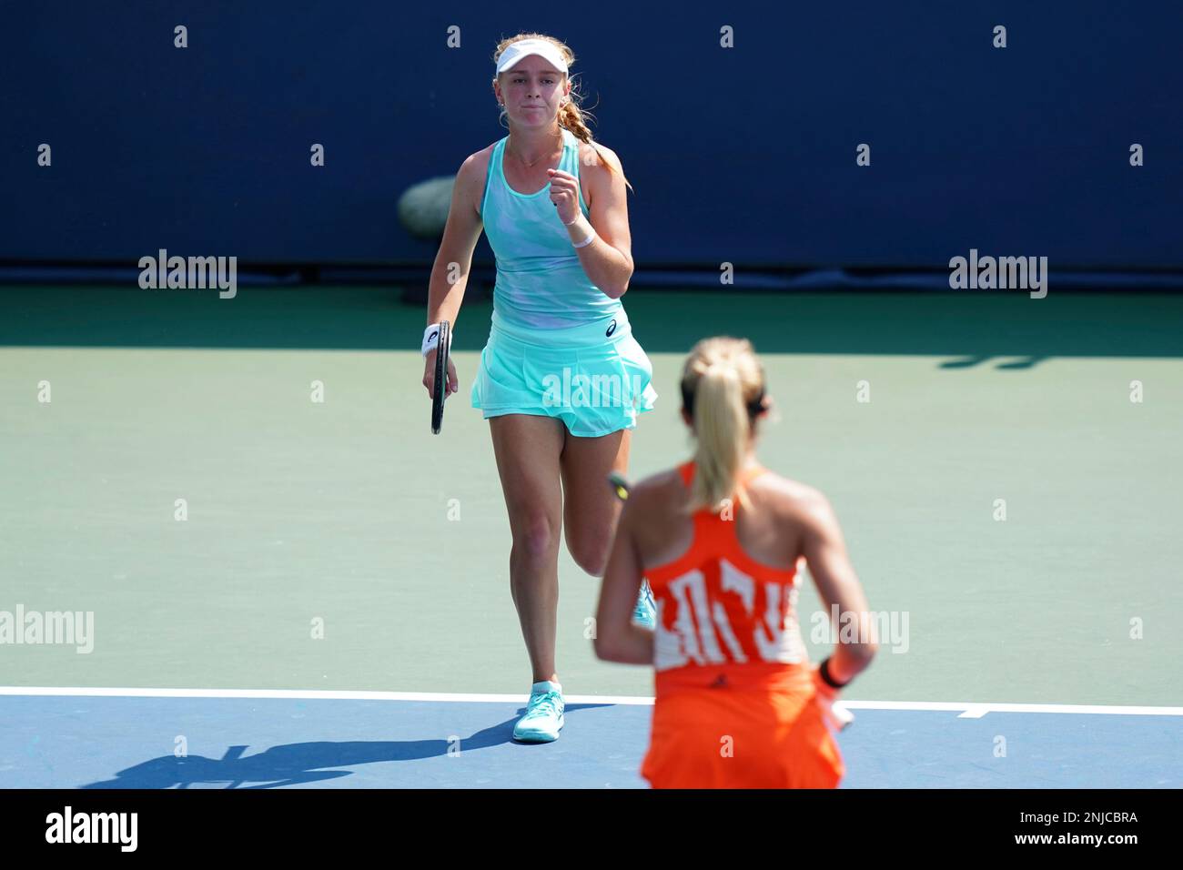 Liv Hovde and Taylah Preston react during a junior girls' doubles ...
