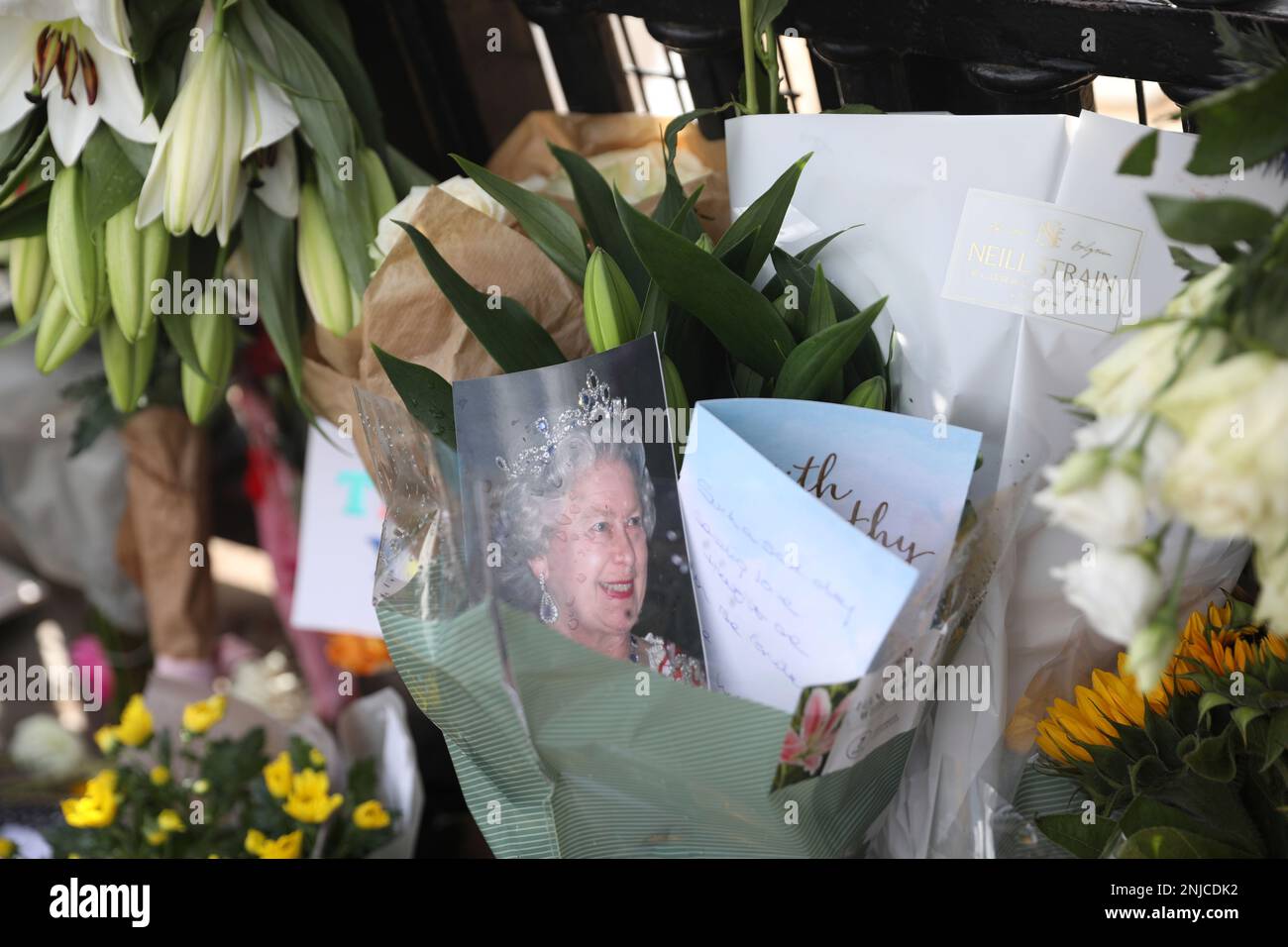 Flowers and pictures in memory of Queen Elizabeth II, at Buckingham ...