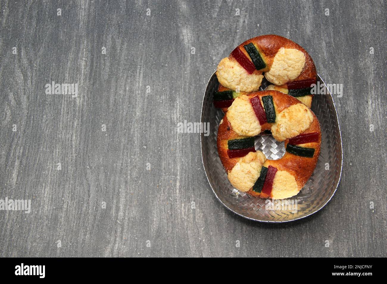 The roscon, rosca de Reyes or king cake, a torus-shaped sweet dough bun ...