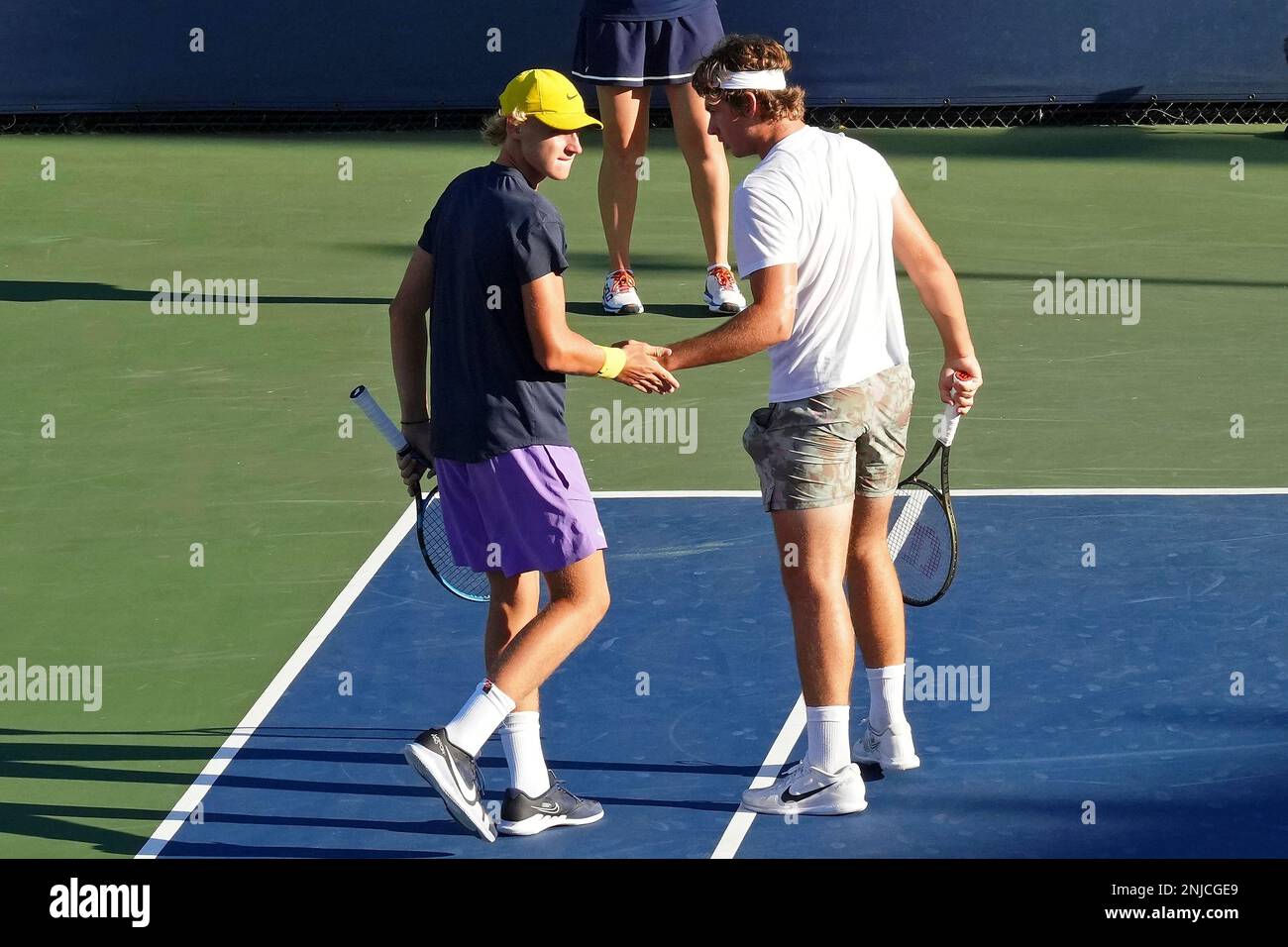 Yaroslav Demin and Leanid Boika react during a junior boys' doubles ...