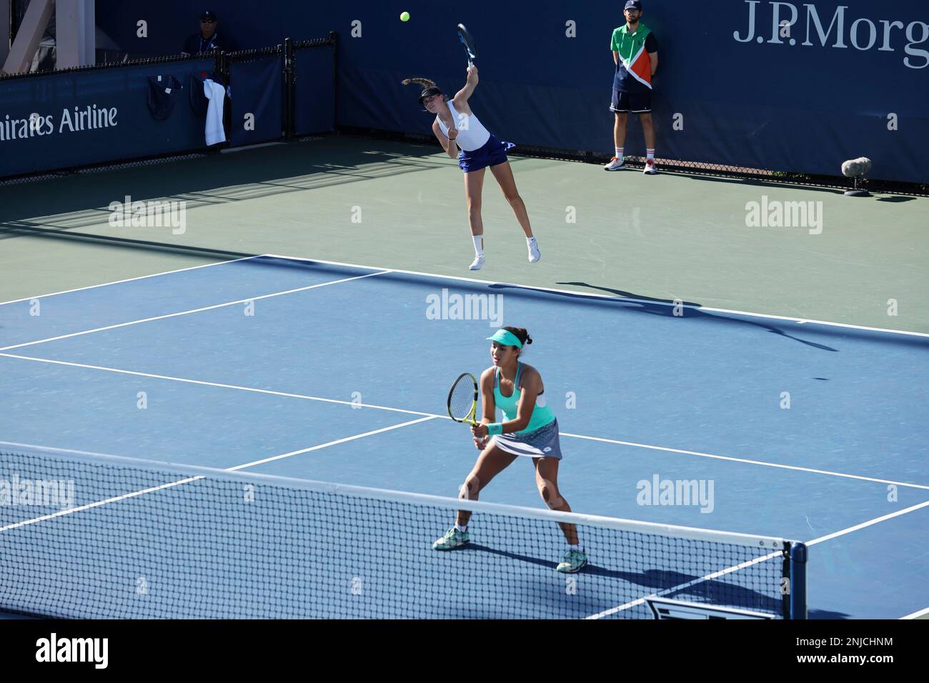 Malak El Allami and Ella McDonald during a junior girls' doubles match ...