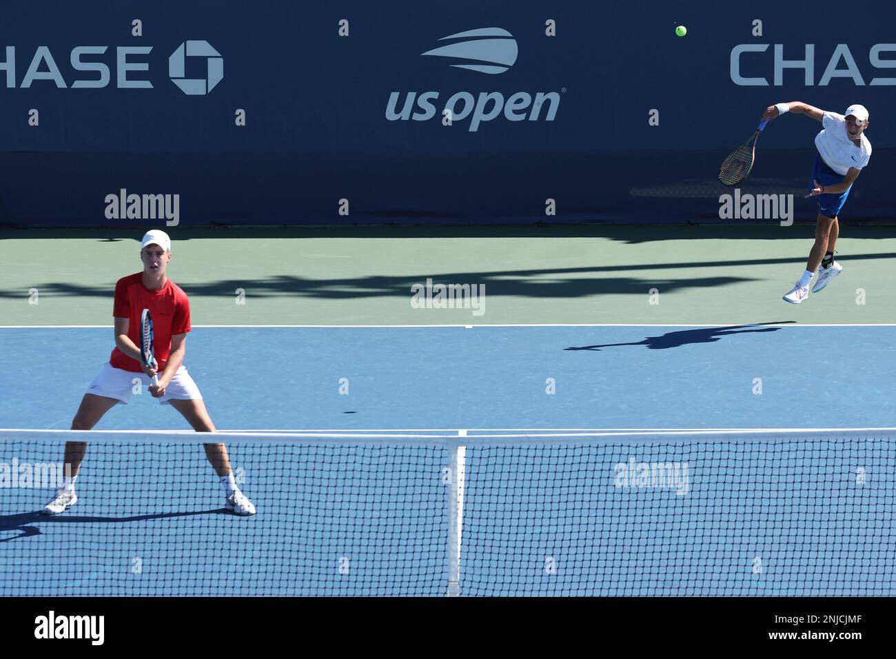 William Jansen and Patrick Brady during a junior boys' doubles match at ...