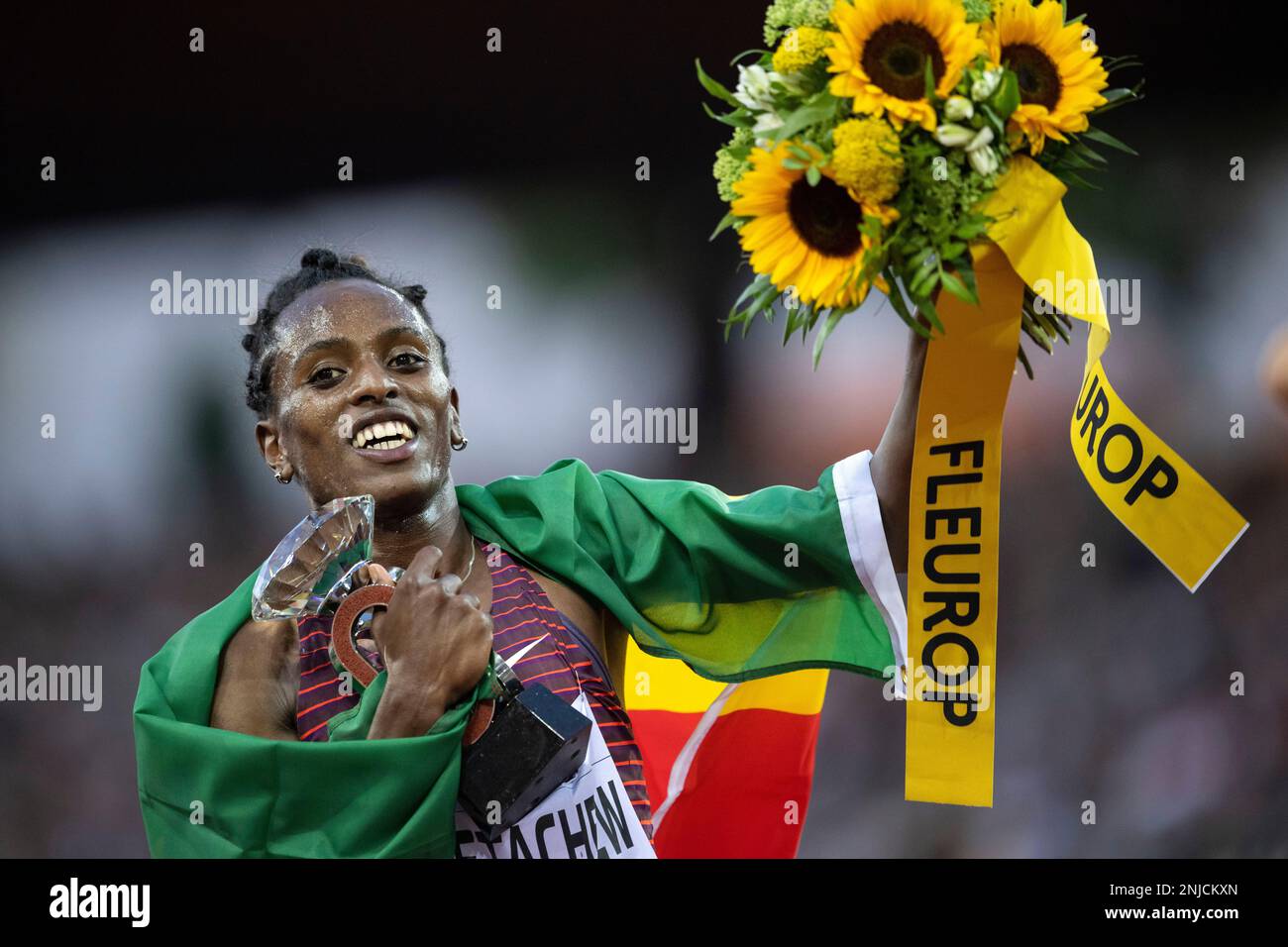 Werkuha Getachew of Ethiopia reacts after winning the 3000m ...