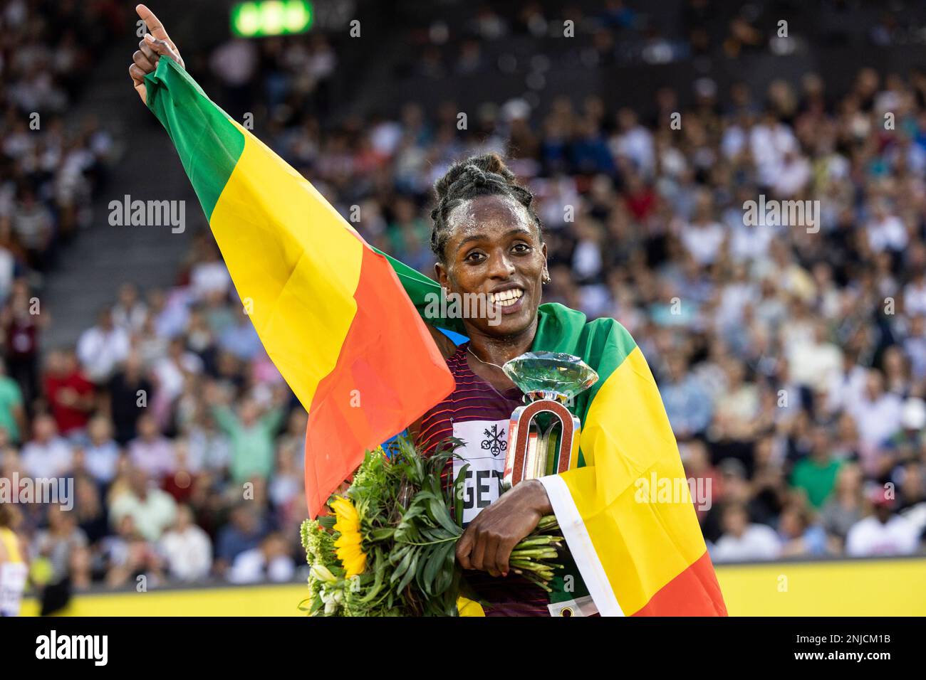 Werkuha Getachew of Ethiopia celebrates after winning the 3000m ...