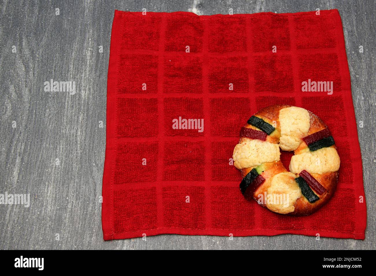 The roscon, rosca de Reyes or king cake is a sweet dough bun decorated ...