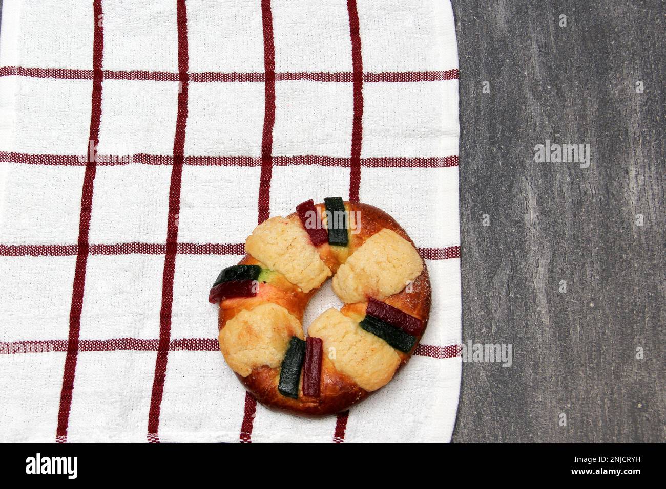 The roscon, rosca de Reyes or king cake, a torus-shaped sweet dough bun ...