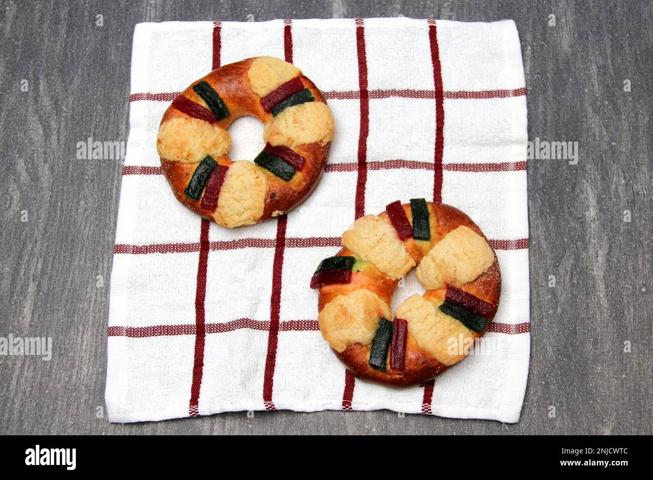 The roscon, rosca de Reyes or king cake, a torus-shaped sweet dough bun ...