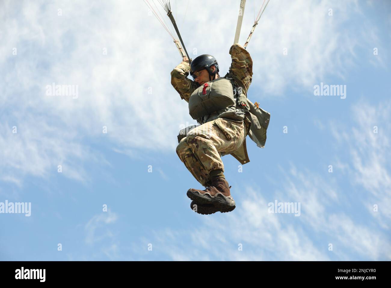 A U.S. Army paratrooper descends onto Glen Rock Drop Zone during ...