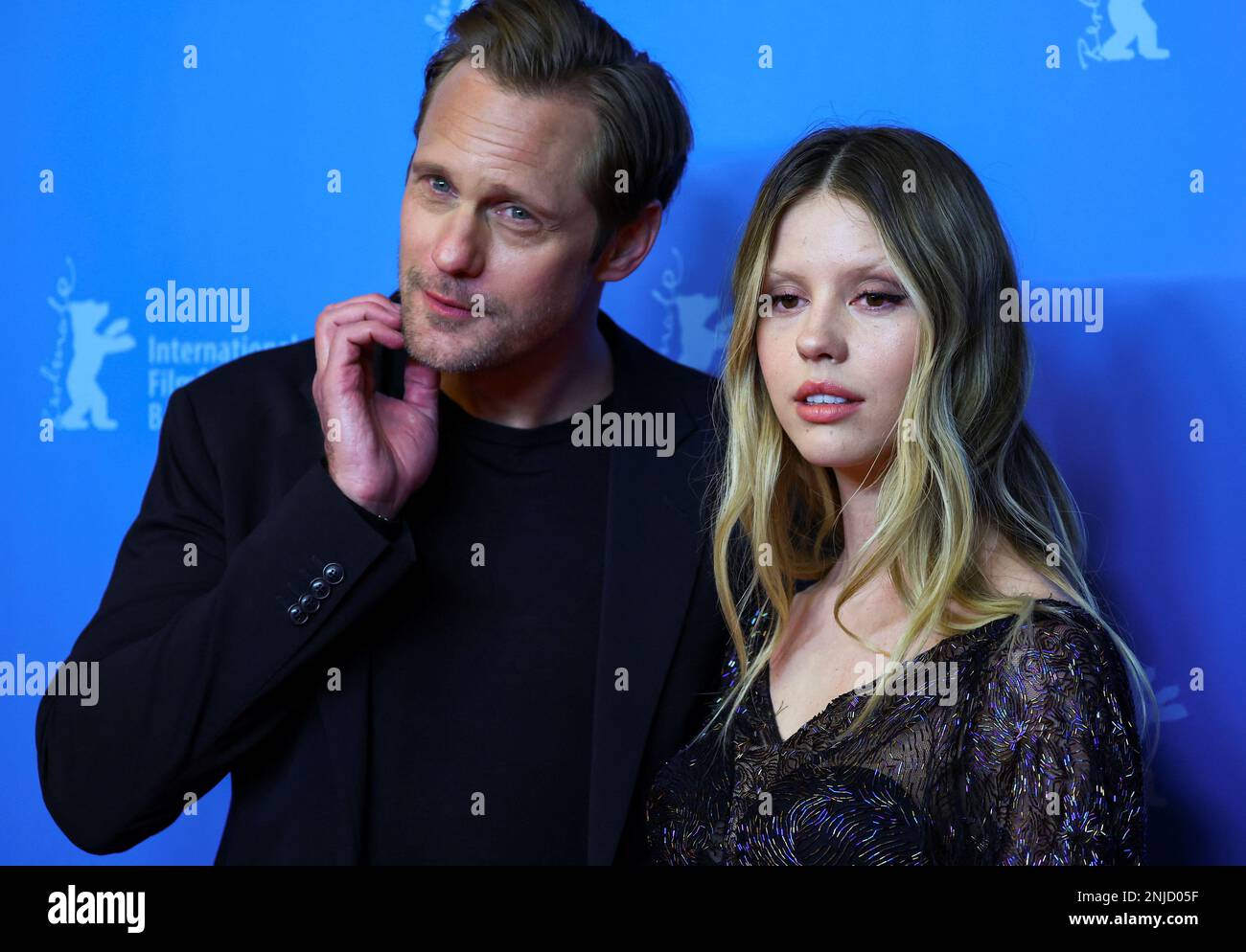 Cast members Alexander Skarsgard and Mia Goth pose on the red carpet ...