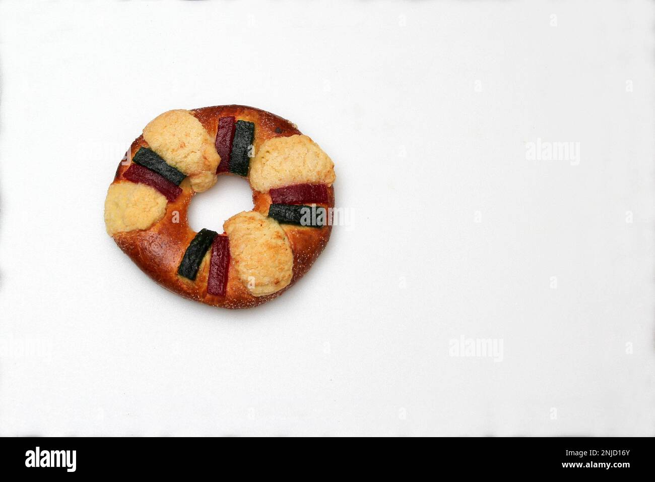 The roscon, rosca de Reyes or king cake, a torus-shaped sweet dough bun ...