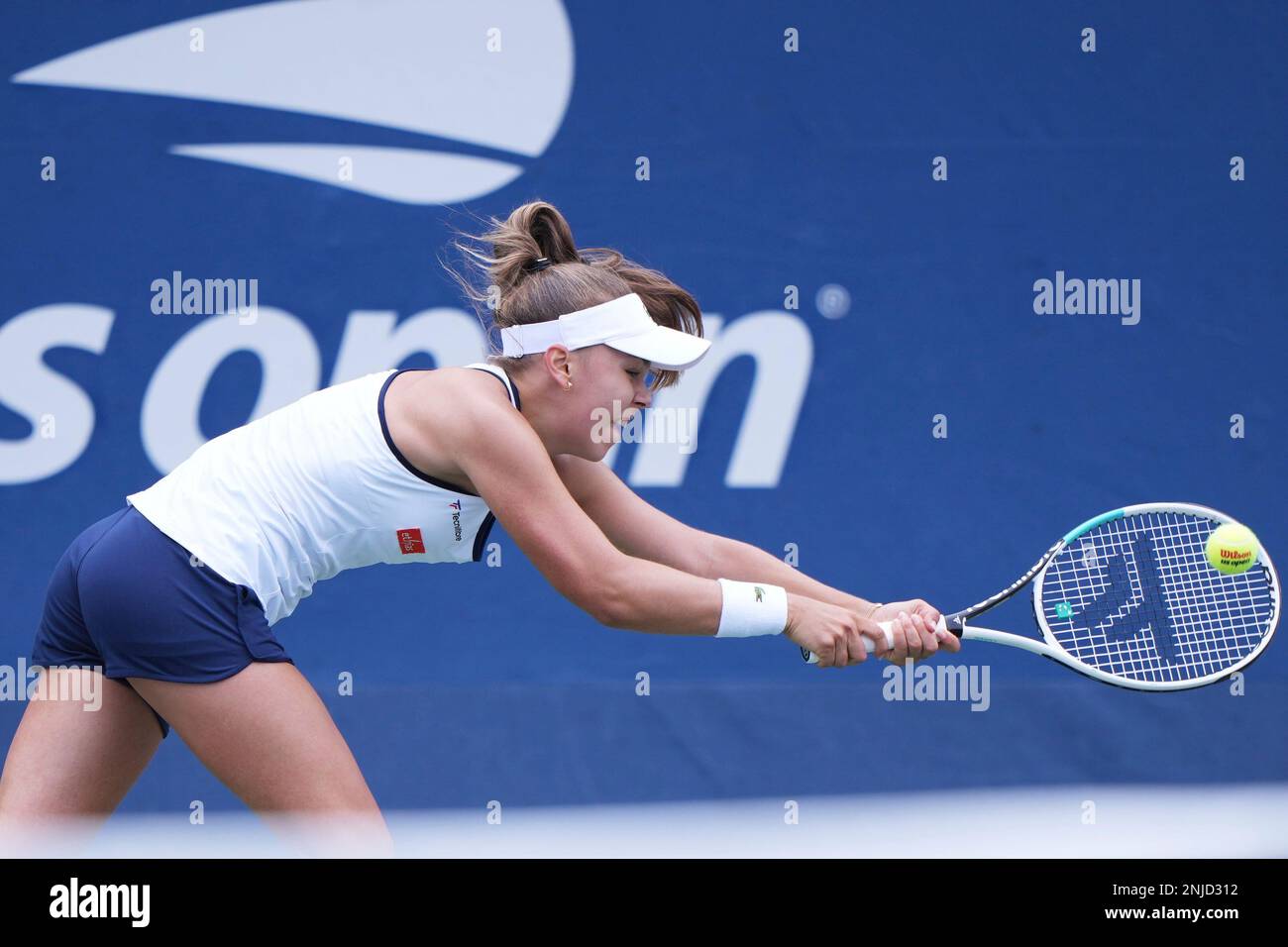Amelie Van Impe during a junior girls' singles match at the 2022 US ...
