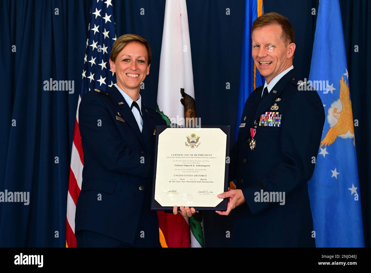 U.S. Air Force Lt. Col. Lyndsey Ballinger, left, commander of the 129th ...
