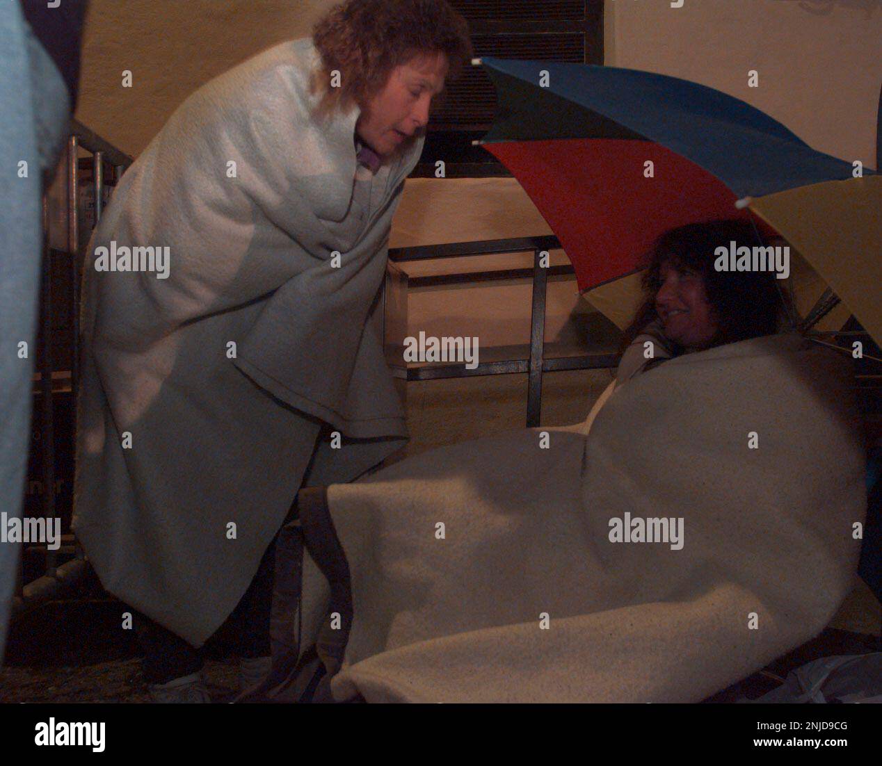 DEATH 8/C/23FEB96/MN/LH--DOREEN BARTHOLOMEW is comforted by friend. She ...