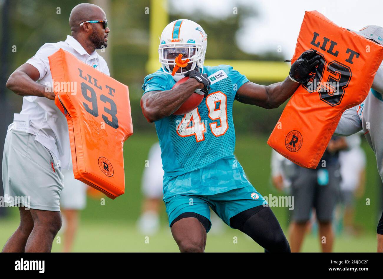 Miami Dolphins linebacker Sam Eguavoen (49) runs with the football ...