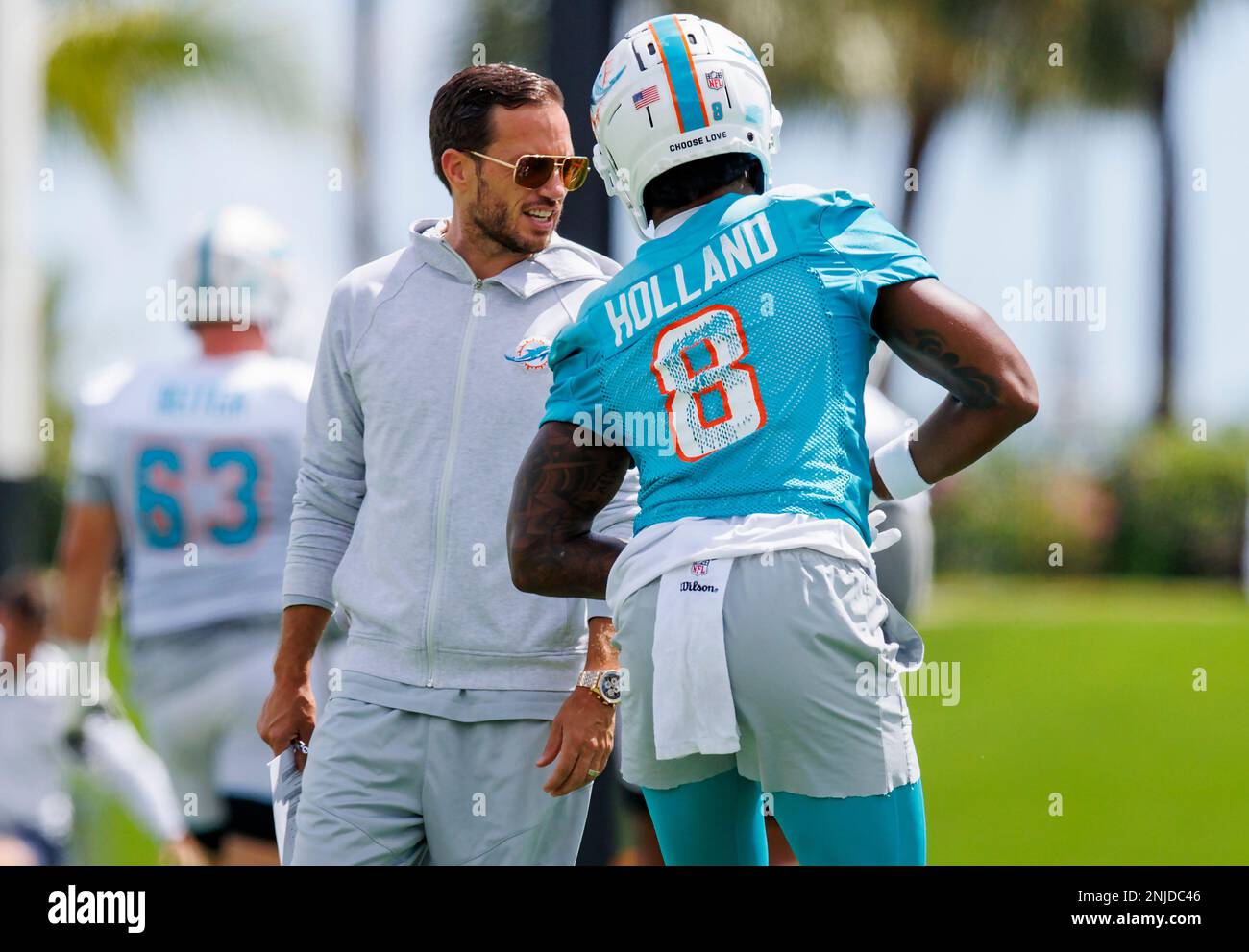 Miami Dolphins head coach Mike McDaniel talks with Dolphins safety ...