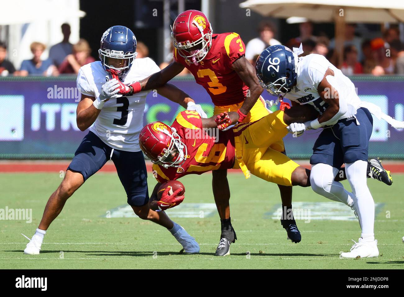 Rice Owls safety Gabe Taylor (26) and cornerback Jordan Dunbar (3) stop ...