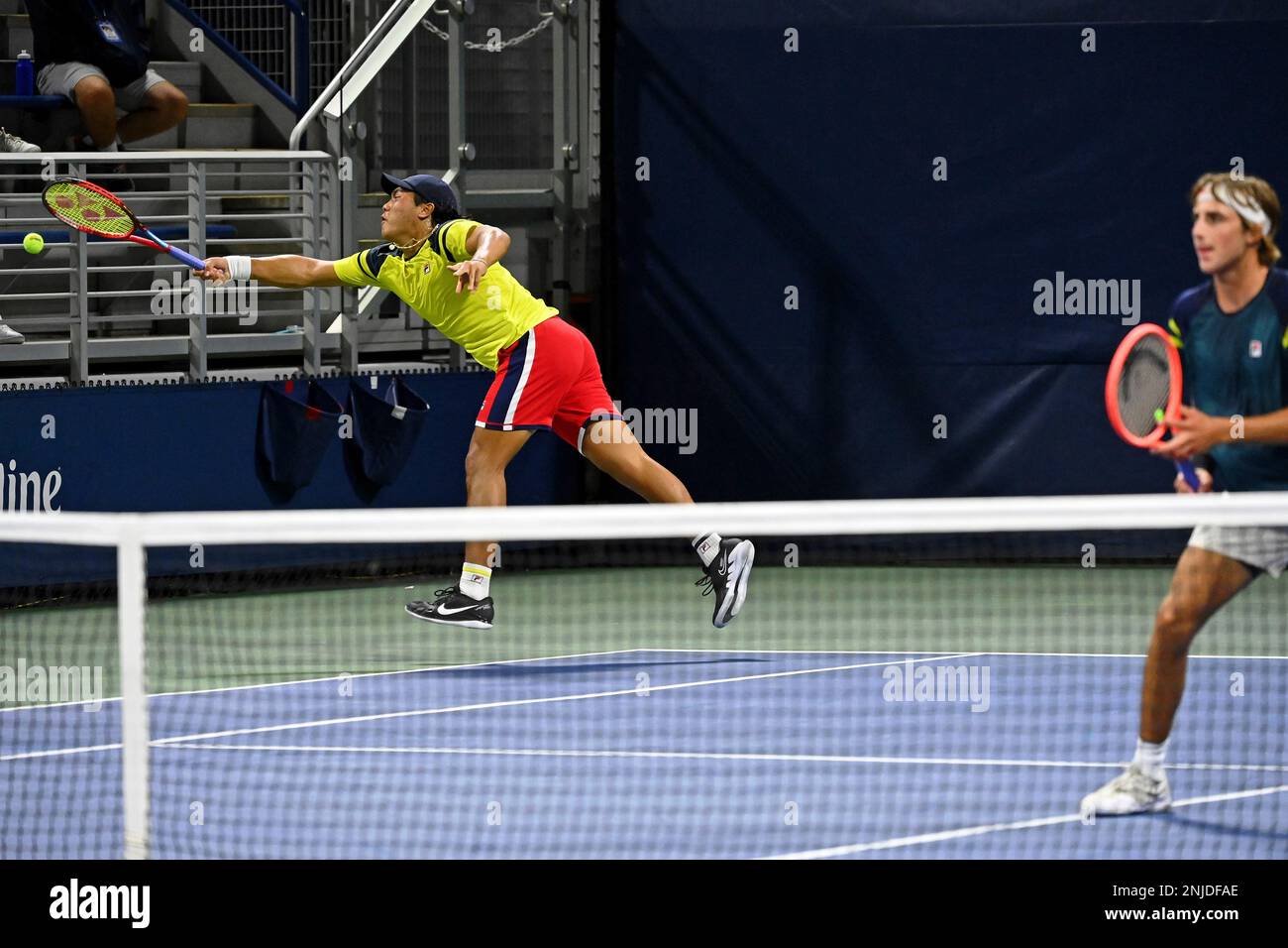Bryce Nakashima Nakashima and Hudson Rivera in action during a junior ...