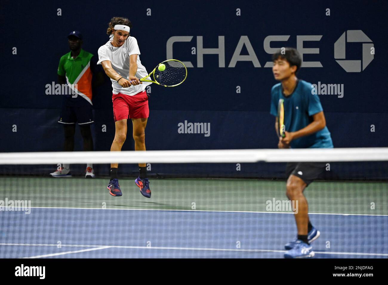 Mihai Alexandru Coman and Hayato Matsuoka in action during a junior ...
